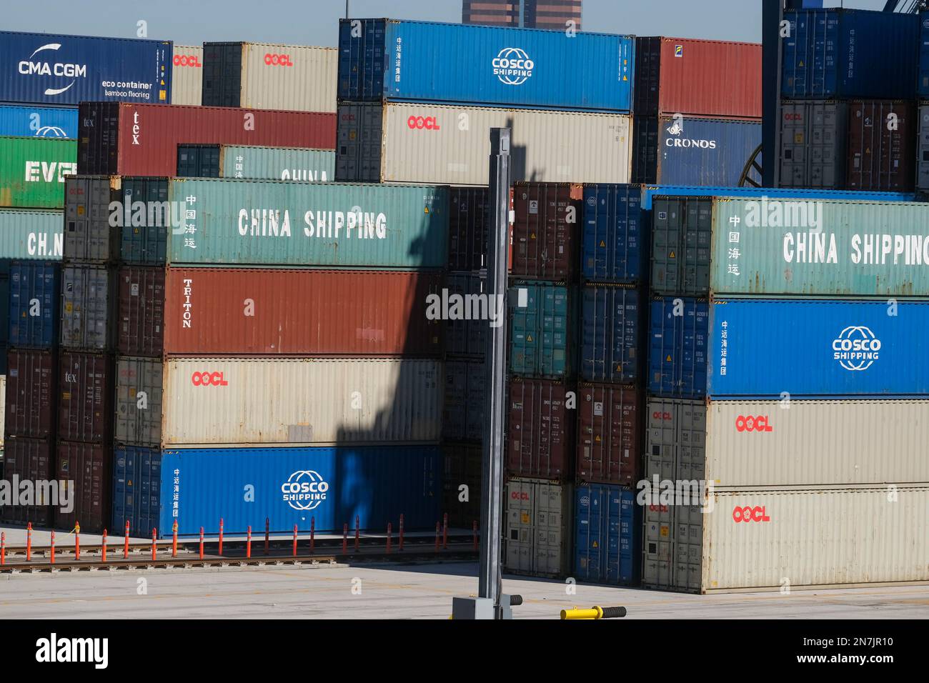 Shipping containers are stacked at the Long Beach Container Terminal ...