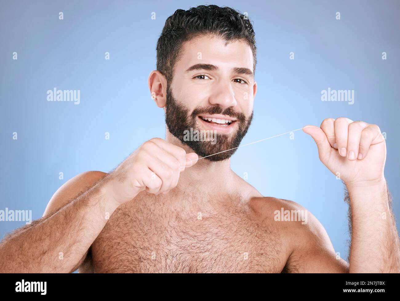 Flossing, dental and man with cleaning teeth, portrait and healthcare ...