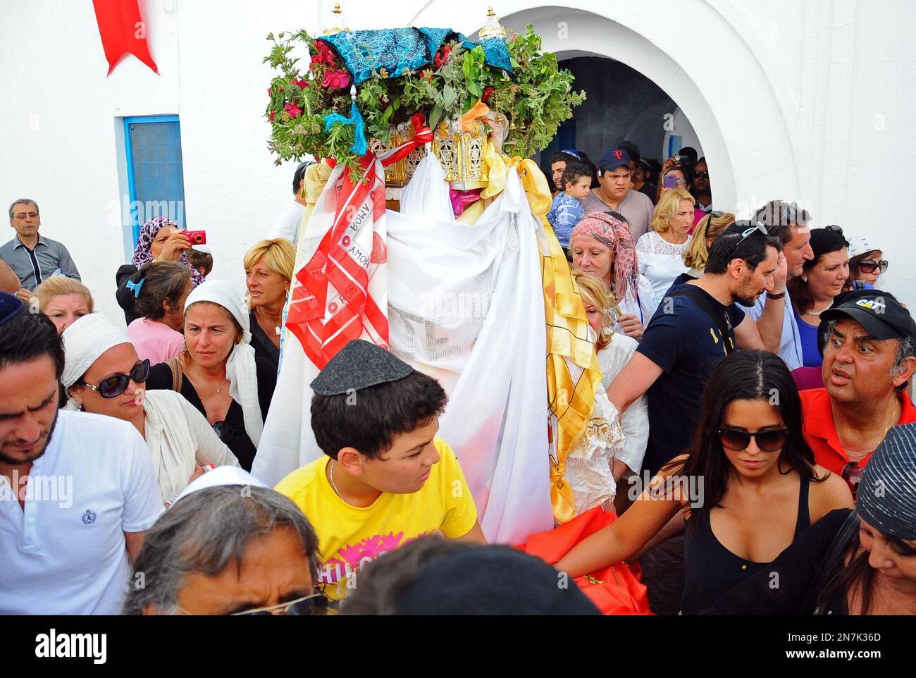 Jewish pilgrims gather for a procession at the Ghriba synagogue, during ...