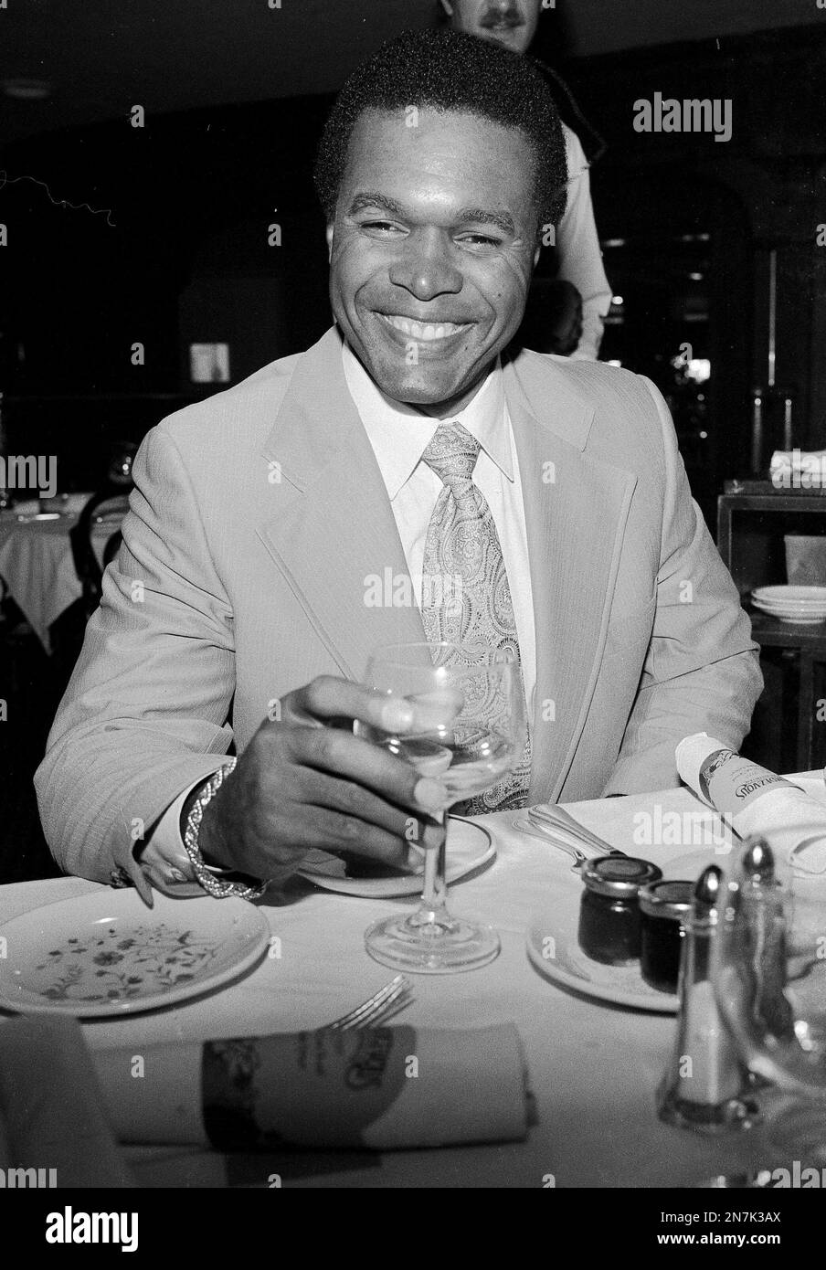 Gale Sayers, All-American, All-Pro and Hall of Fame inductee, smiles at ...