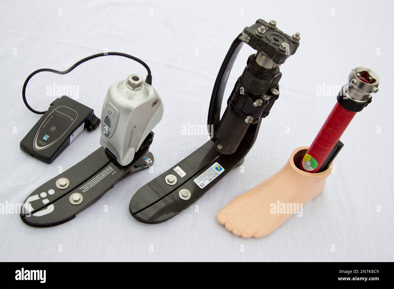 FILE - From left, a microprocessor controlled ankle/foot prosthetic, a ...
