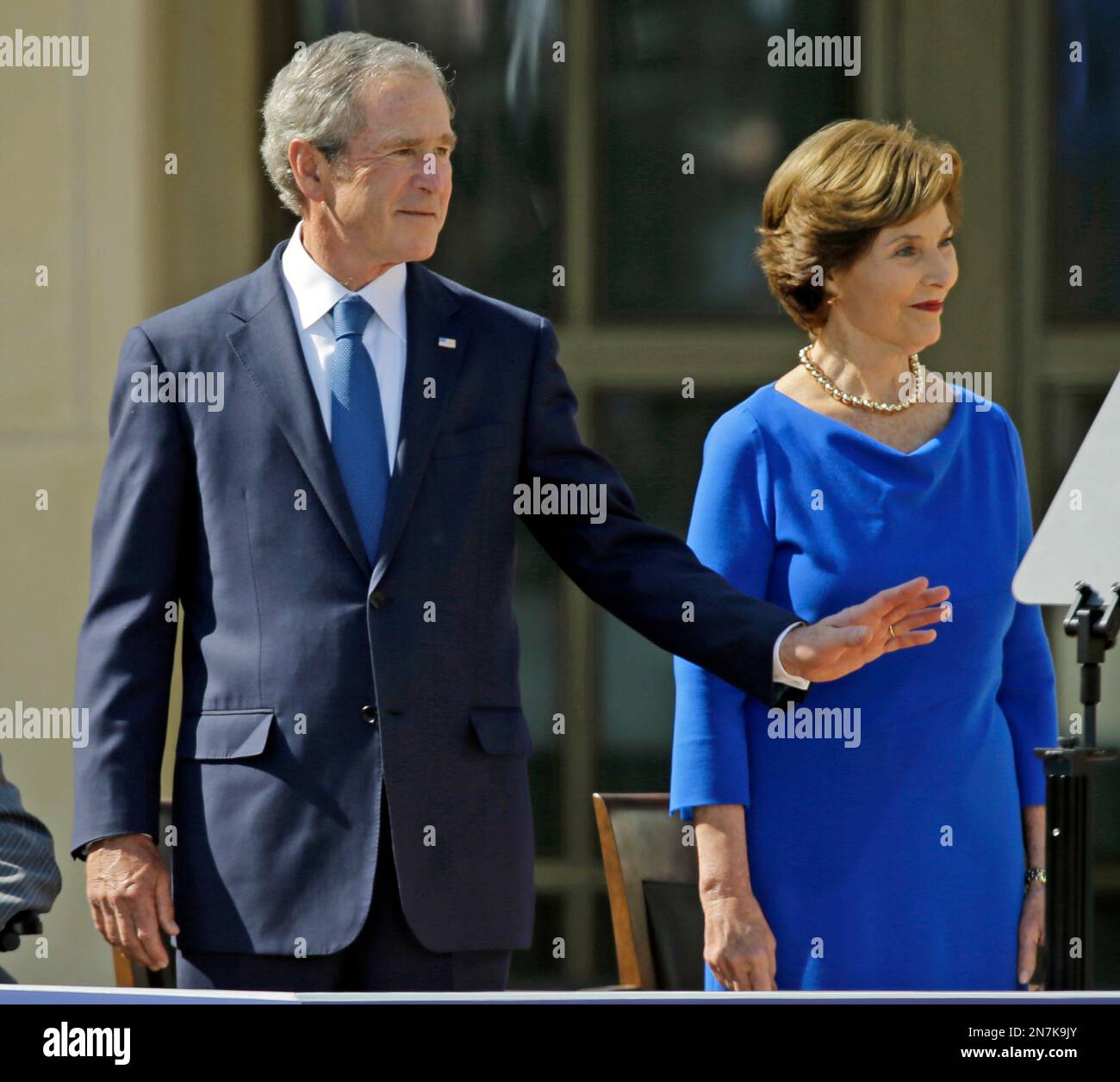 Former president George W. Bush and his wife, former first lady Laura ...