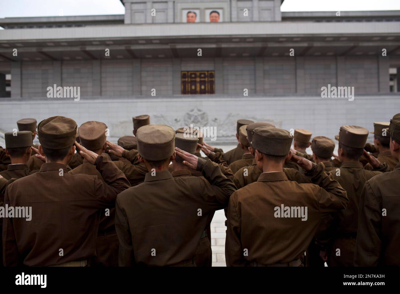 North Korean soldiers salute in front of Kumsusan Palace of the Sun ...