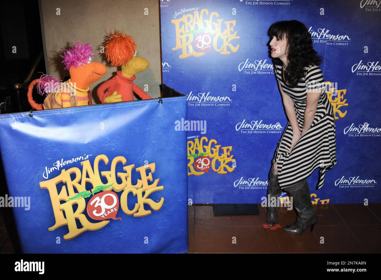 Red Fraggle, left, Gobo Fraggle, and Jackie Geary arrive at Jim Henson ...