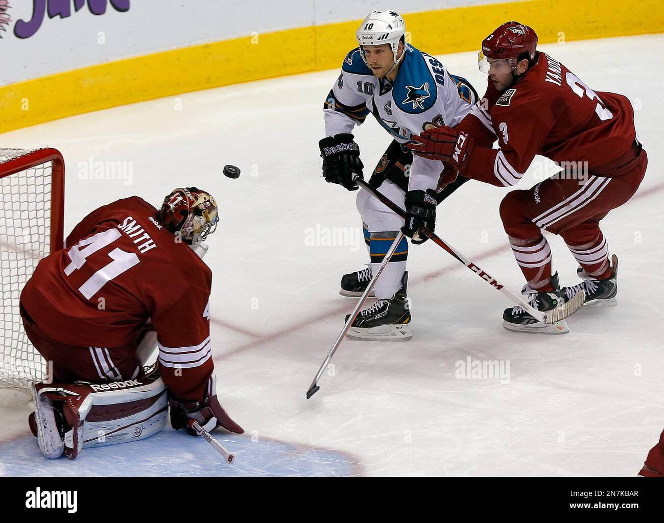 San Jose Sharks' Andrew Desjardins (10) shoots on-goal as Phoenix ...
