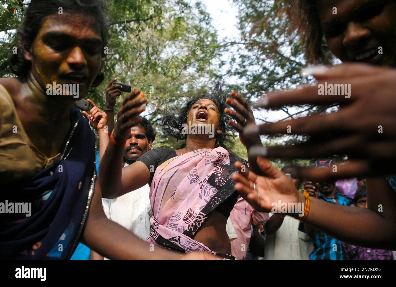 An Indian eunuch dances in a trance after the widow ritual symbolizing ...