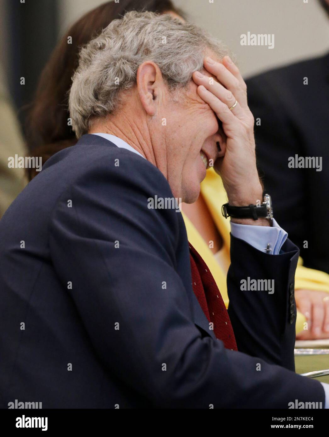 Former President George W. Bush participates in a signing ceremony for ...
