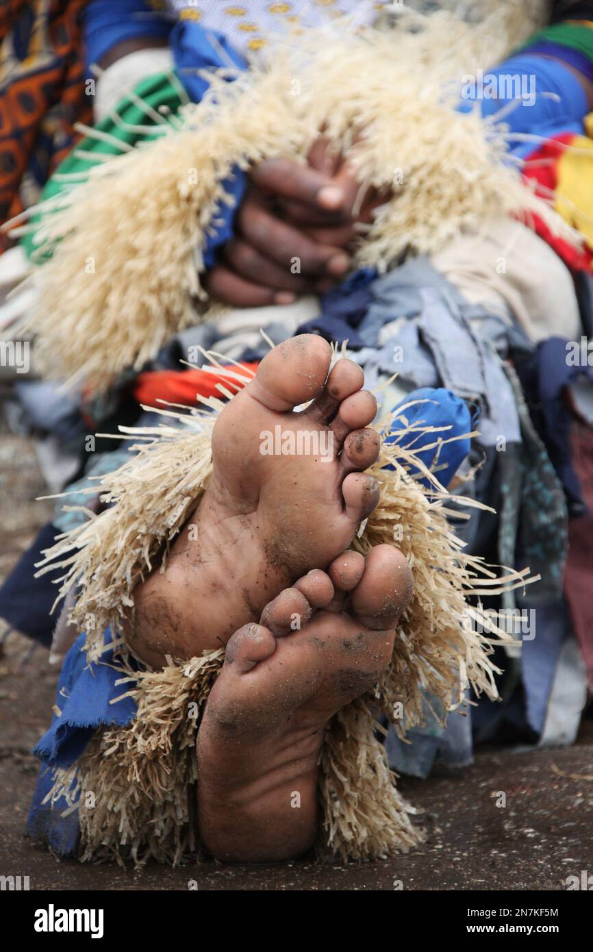A traditional nyau dancer is seen before a performance at a police pass ...