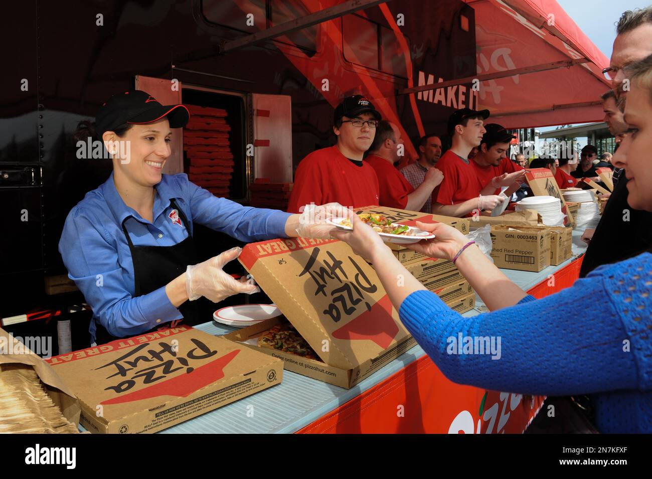 IMAGE DISTRIBUTED FOR PIZZA HUT - Pizza Hut team members including ...