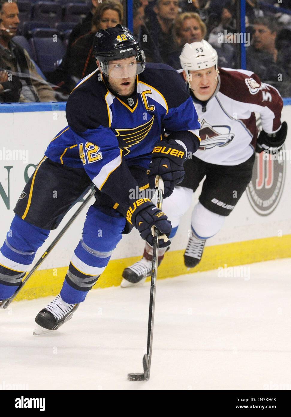 St. Louis Blues' David Backes (42) skates around Colorado Avalanche's ...