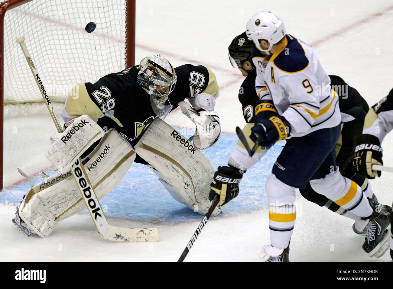 Buffalo Sabres' Steve Ott (9) deflects a rebound for a goal against ...