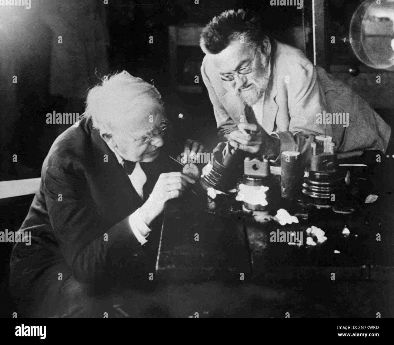 American inventor and businessman Thomas Alva Edison, left, somewhere ...