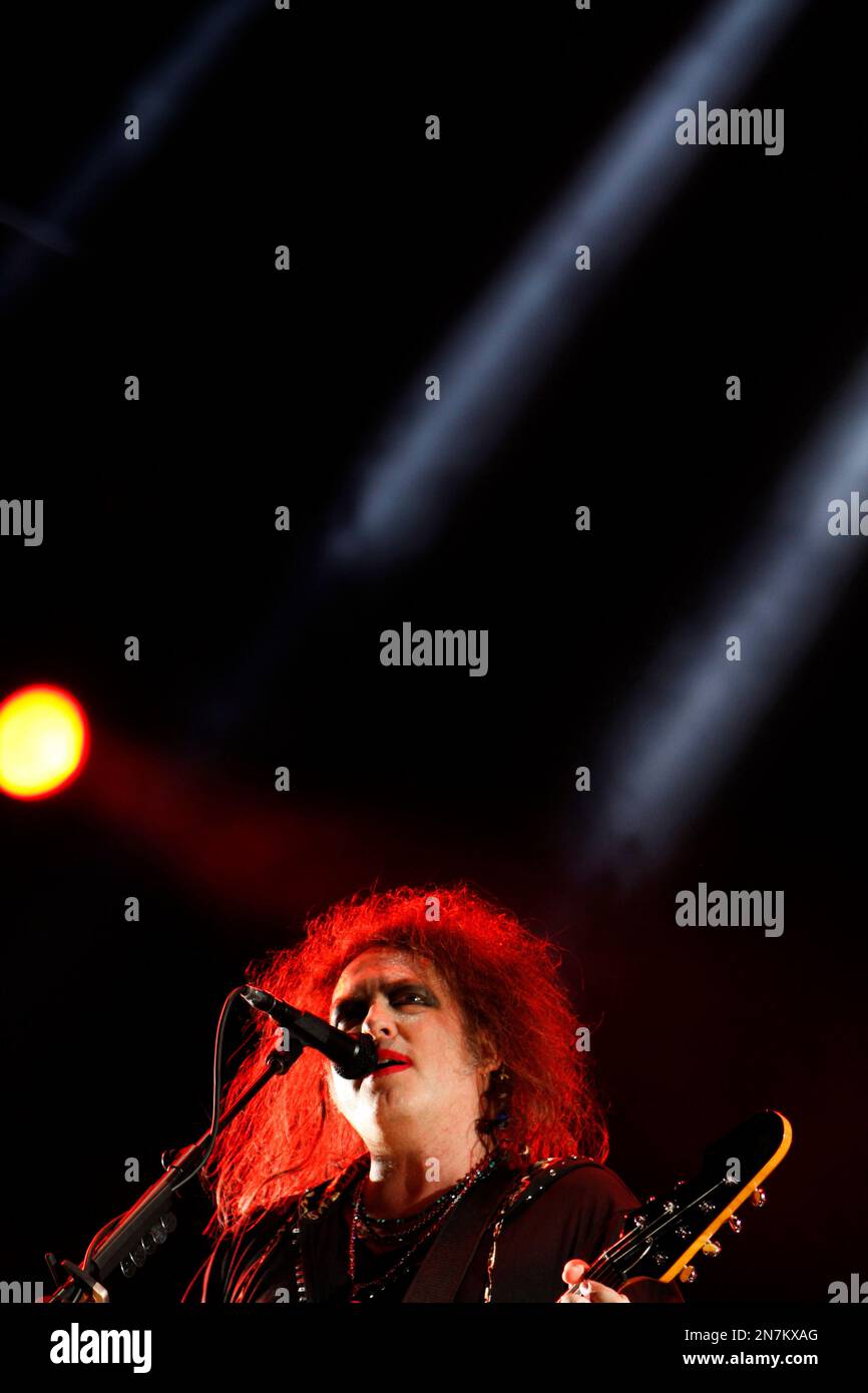 Robert Smith, lead vocalist and guitarist for the English band The Cure ...