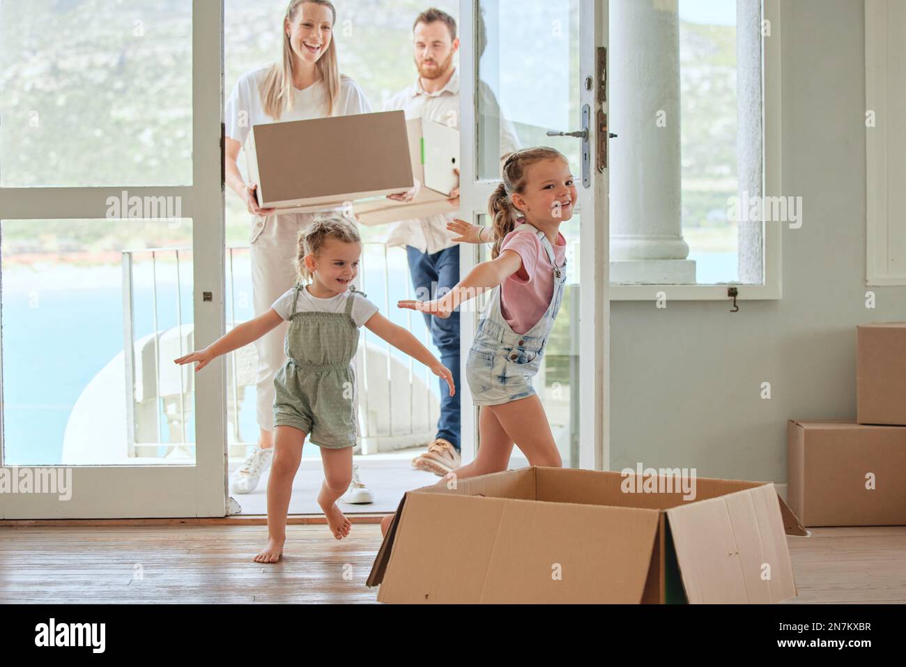 Embracing this new beginning. a young family moving into their new home ...