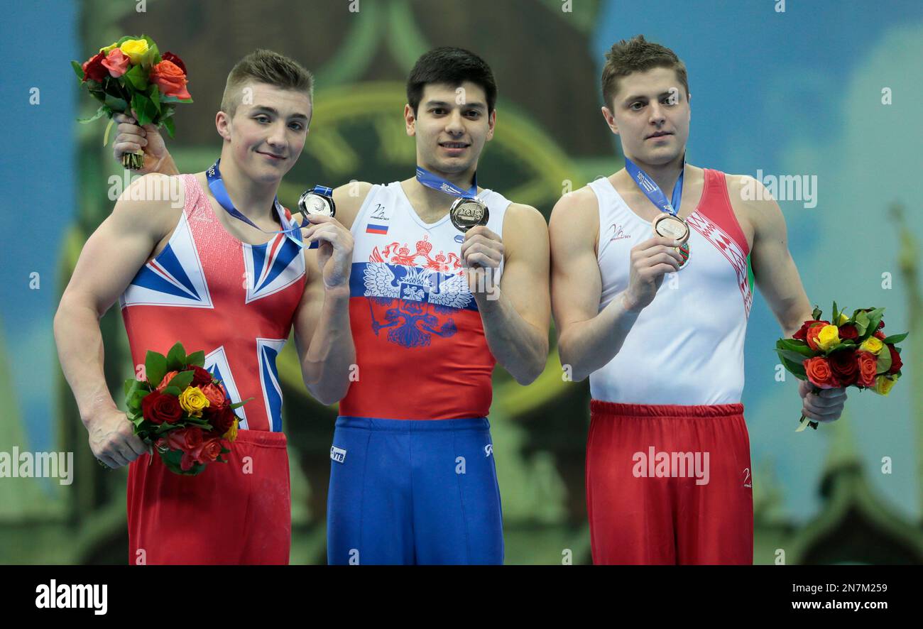 From left, silver medal winner Sam Oldham of Britain, gold medal winner ...
