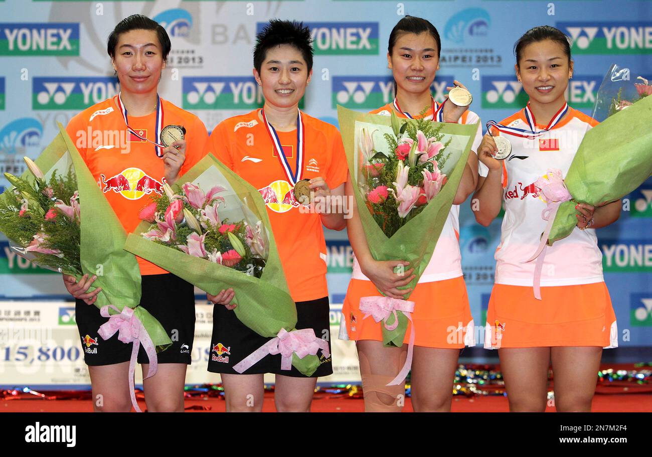 China's players from left, Wang Xiaoli, Yu Yang, Tang Jinhua, and Ma Jin pose with gold and ...
