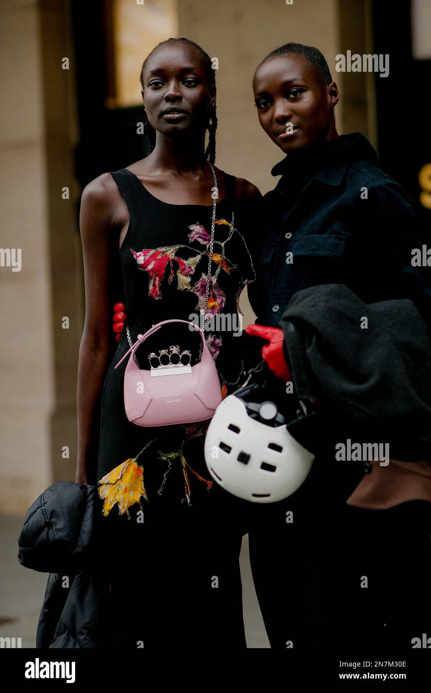 Street style, models Ayuol Manyok and Rouguy after Patou Fall Winter ...