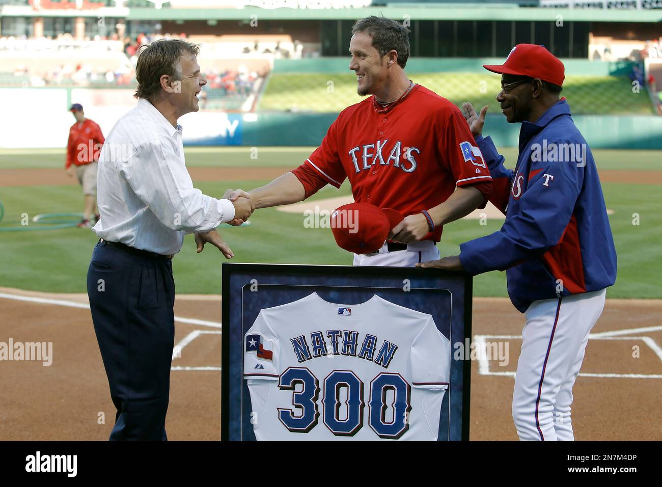 Texas Rangers relief pitcher Joe Nathan (36) greets former Texas ...