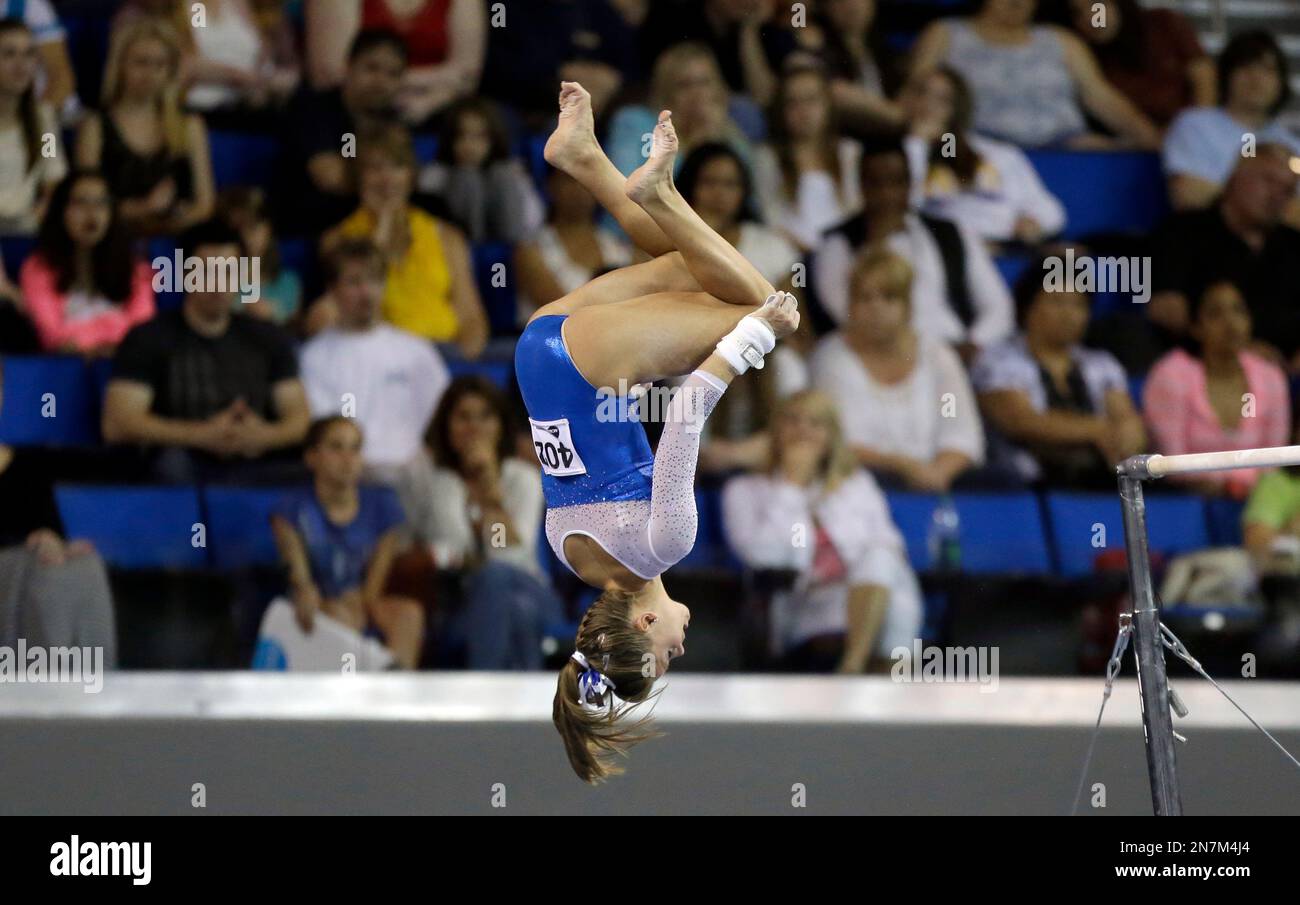Mackenzie Caquatto of Florida competes on the uneven parallel bars in ...