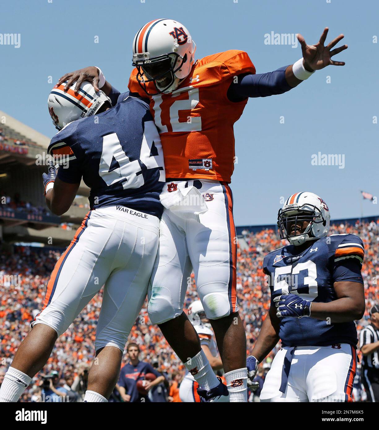 Auburn Anthony Swain (44) reacts with Jonathan Wallace after scoring ...