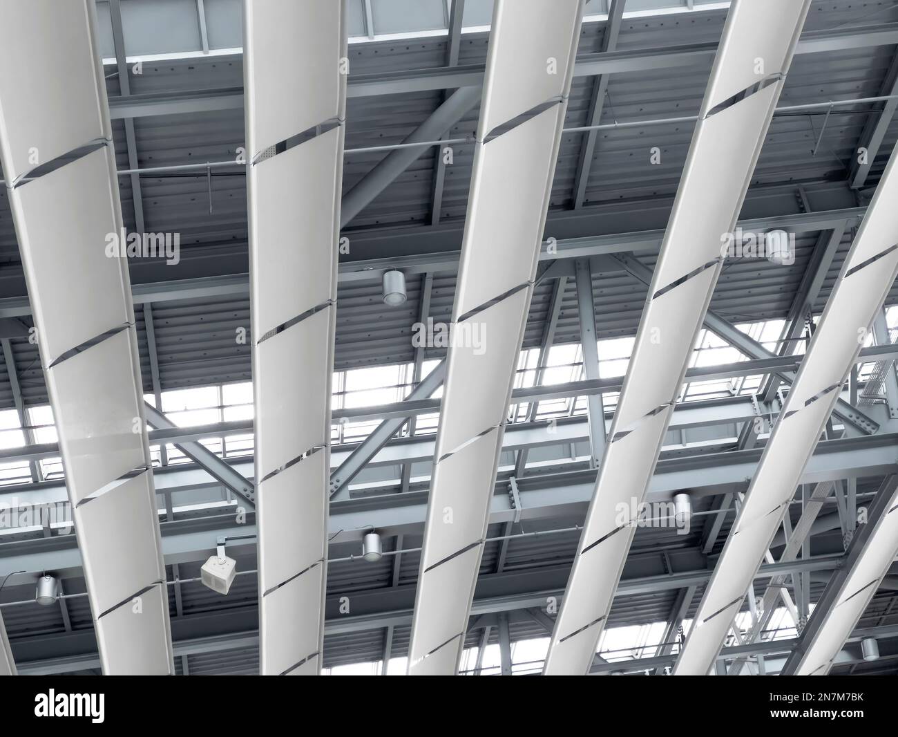 Lights and ventilation system in long line on ceiling of the industrial ...