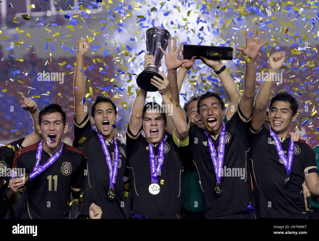 Members of Mexico's Under-17 soccer team celebrate winning the Concacaf ...
