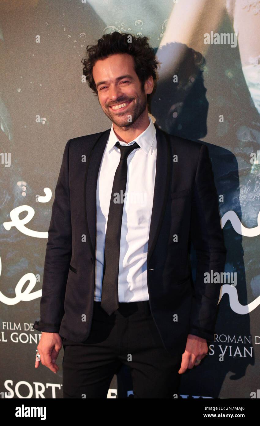 French actor Romain Duris poses for photographers at the premiere of ...