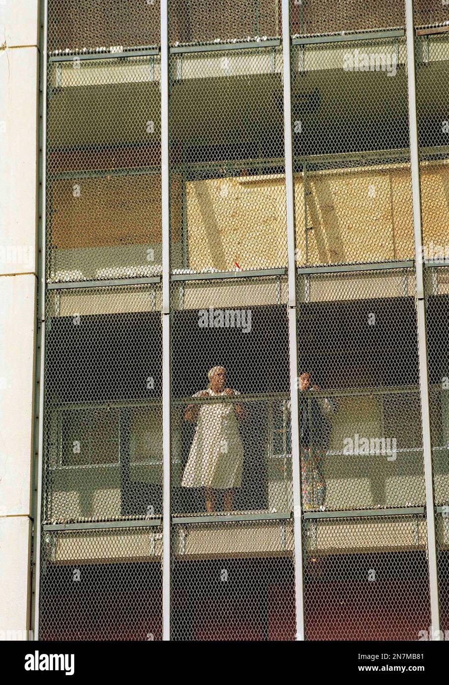 Residents from Chicago's Cabrini-Green public housing look out from ...