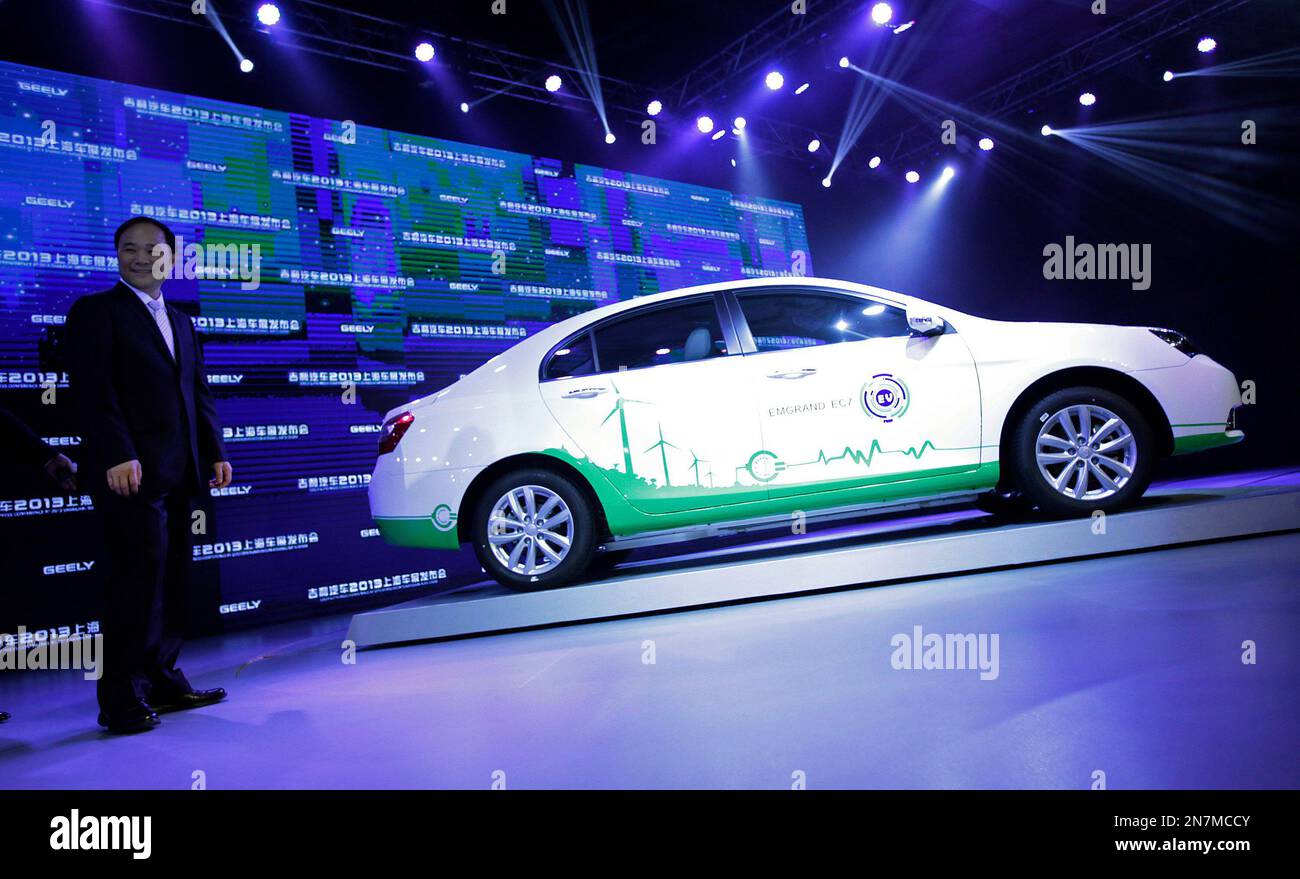 Geely Holding Group Chairman Li Shufu stands near the Chinese automaker ...