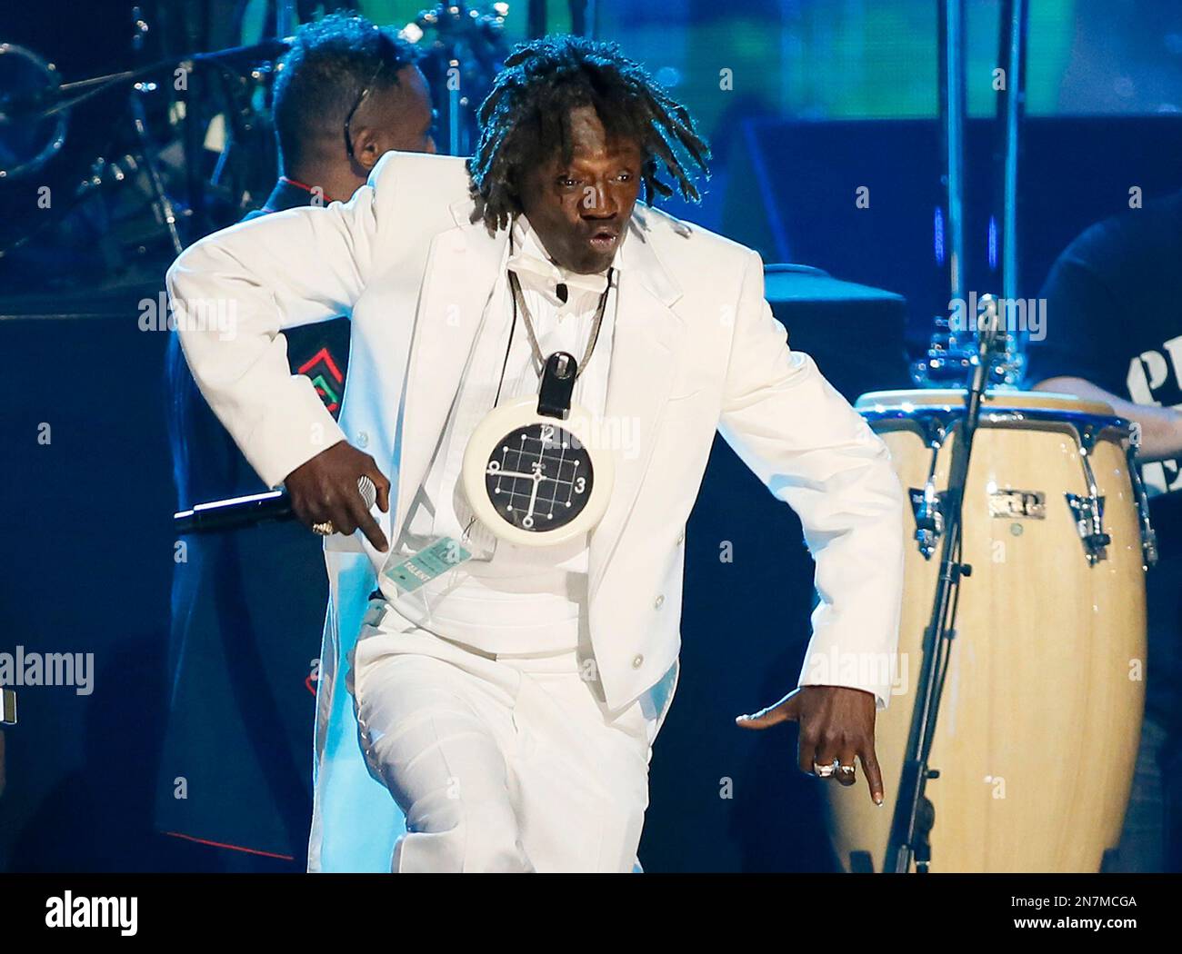 Flavor Flav of Public Enemy performs during the band's induction at the ...