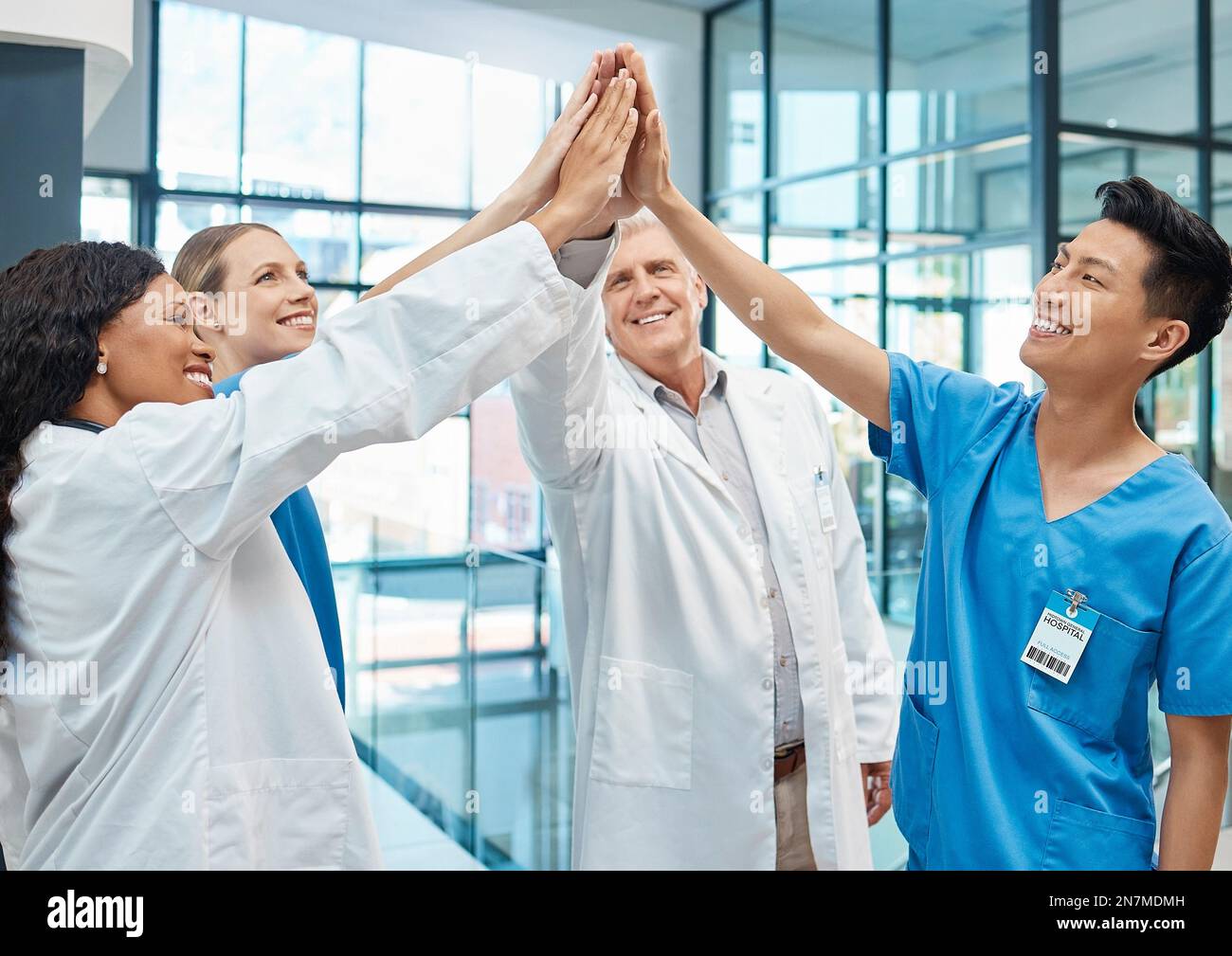 Today was a good day. a group of doctors putting their hands together ...