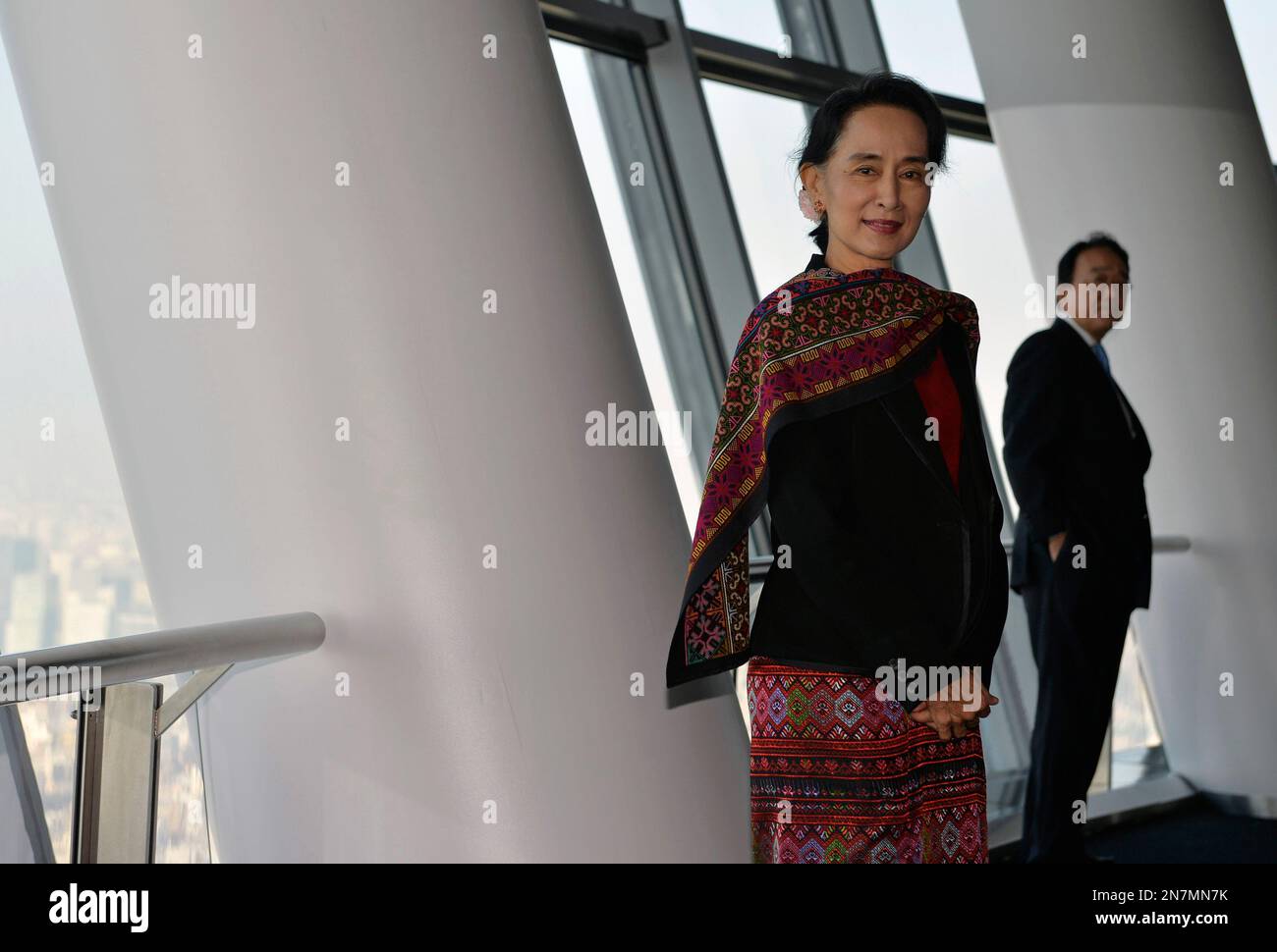 Myanmar opposition leader Aung San Suu Kyi poses as she visits the 350 ...