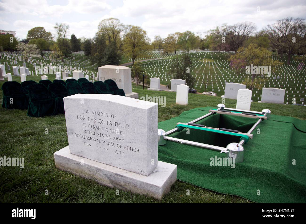 A memorial marker for Army Lt. Col. Don C. Faith Jr., inscribed on back ...