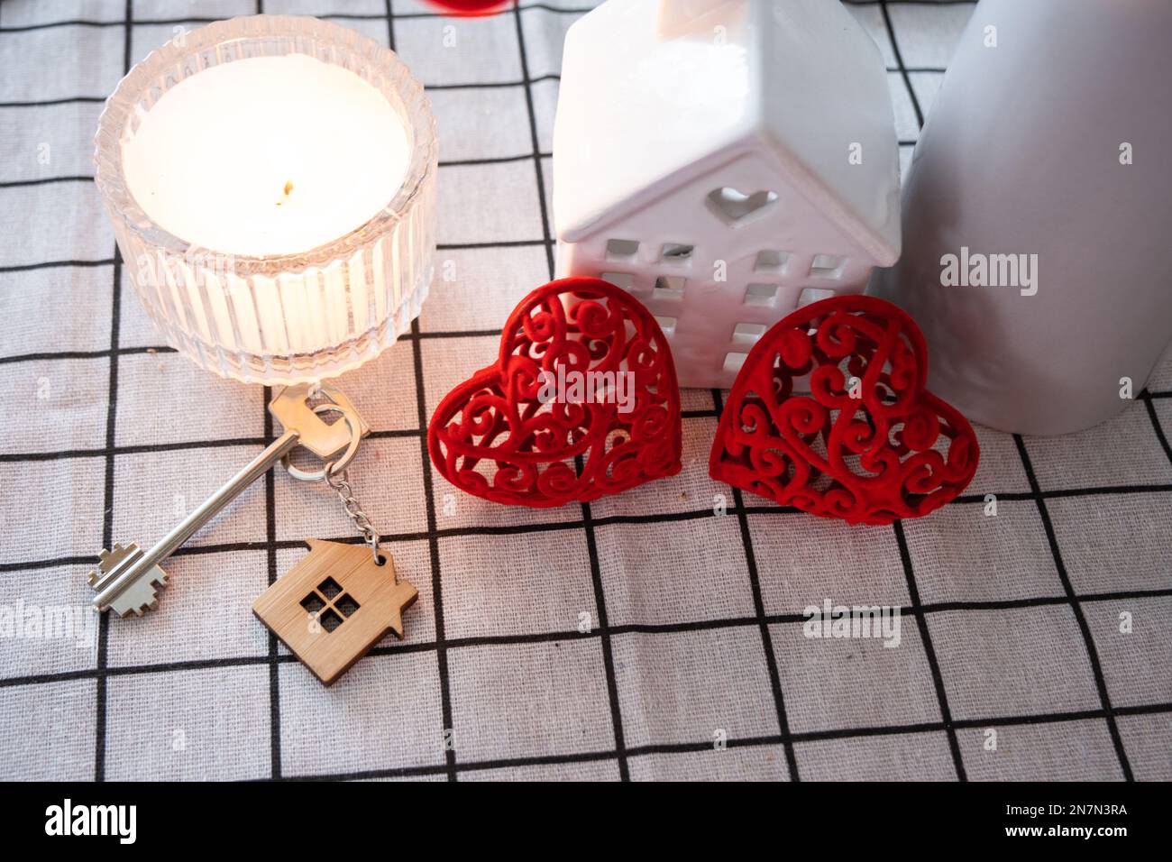 Key to house of cozy home with Valentine decor on table of kitchen ...