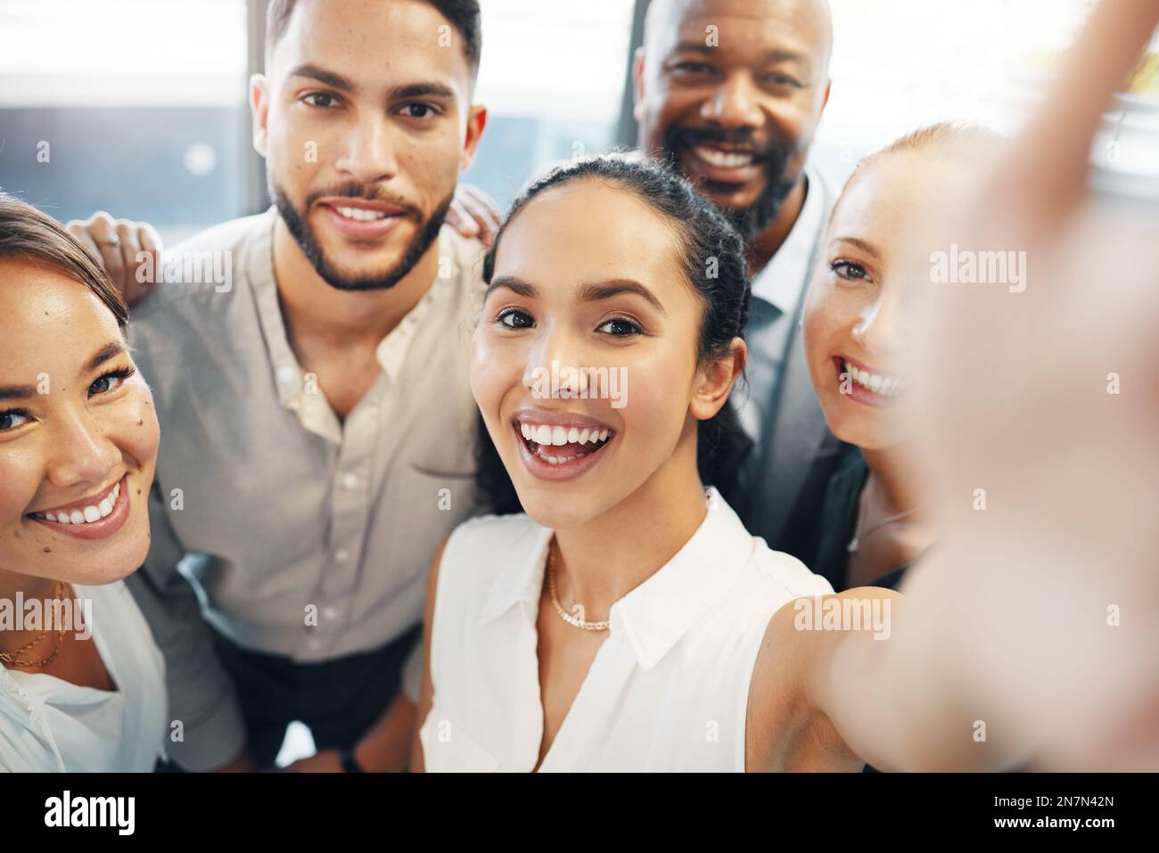 We accomplish goals together. a diverse group of businesspeople ...