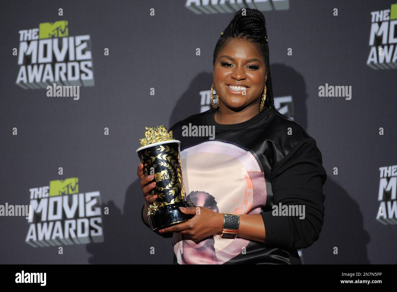 Ester Dean poses backstage with the award for best musical moment for ...