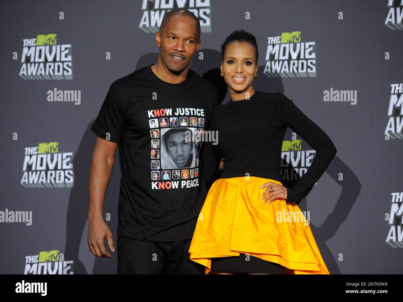 Kerry Washington, right, and Jamie Foxx pose backstage at the MTV Movie ...