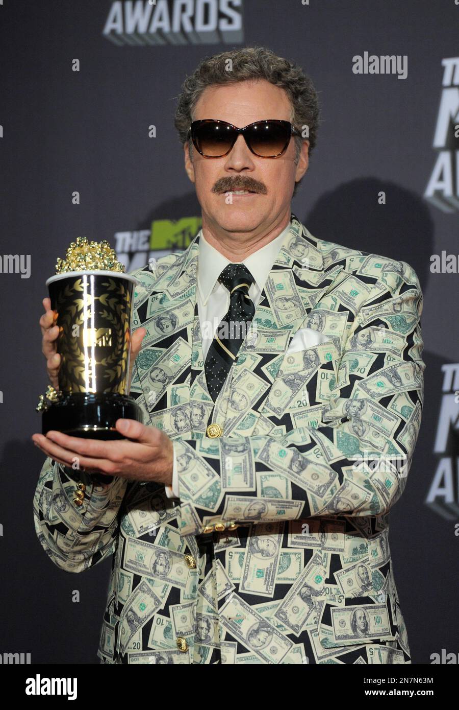 Will Ferrell poses with the comedic genius award backstage at the MTV ...