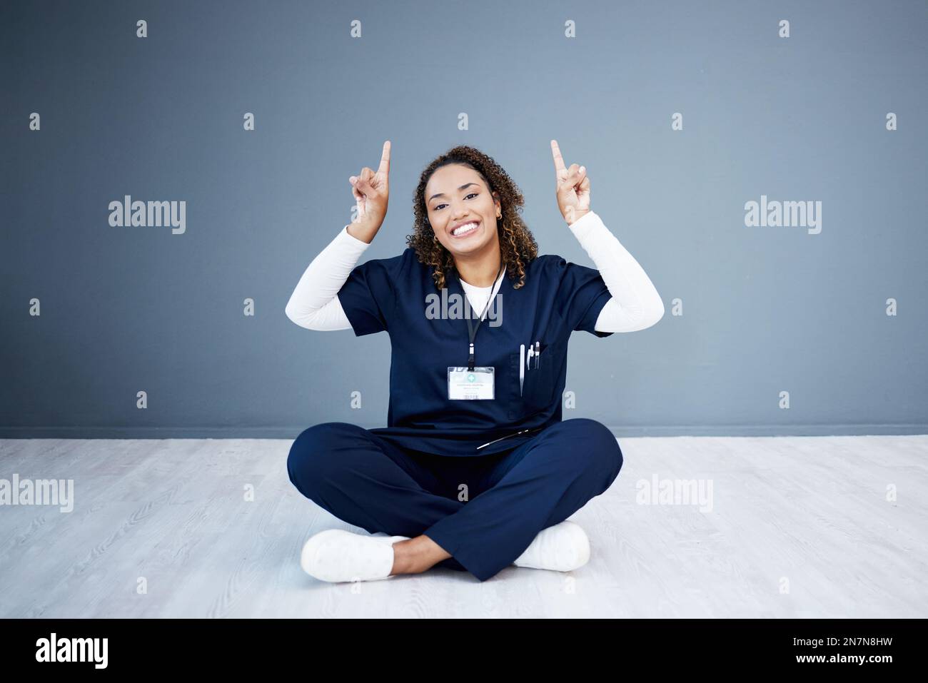 Nurse, portrait or pointing up at hospital promotion, life insurance ...