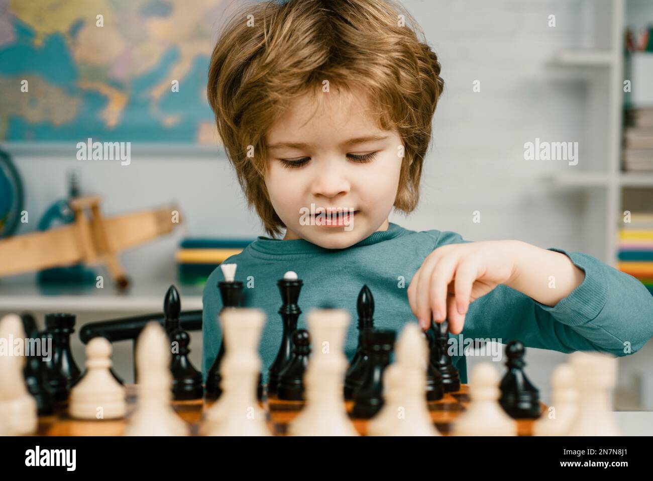 Kid Playing Chess. Kids educational games, child early development ...