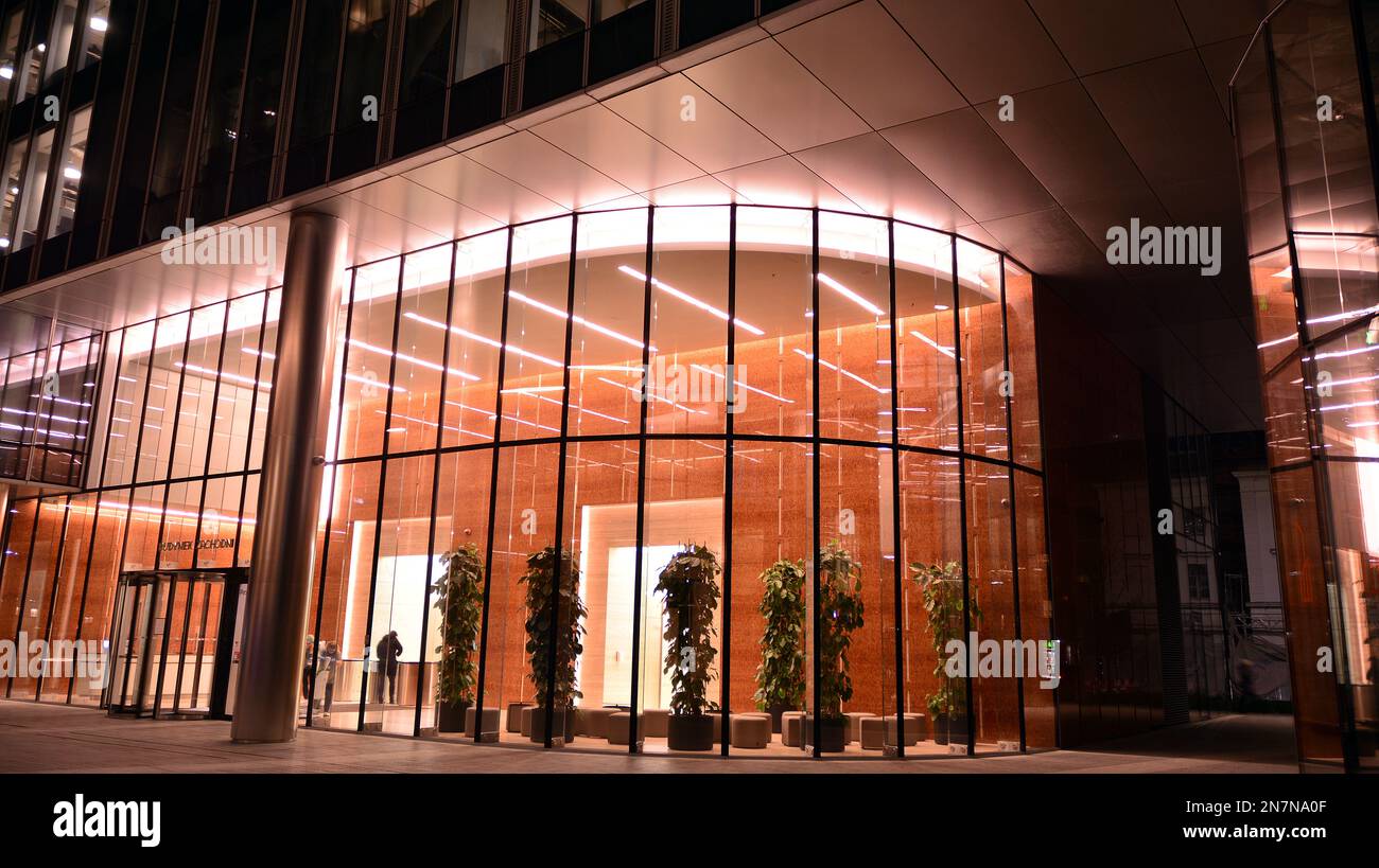 Modern office building in city at the night. View on illuminated ...