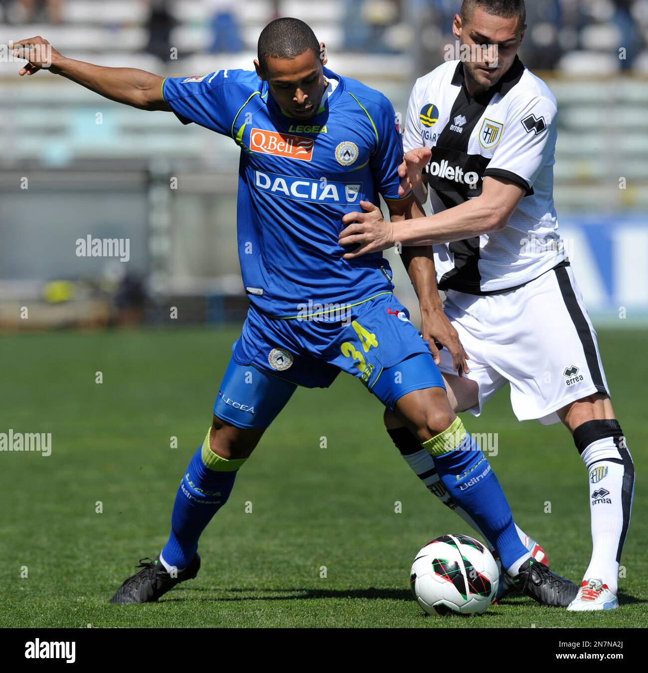 Parma's Aleandro Rosi, right, vies for the ball with Udinese's Gabriel ...