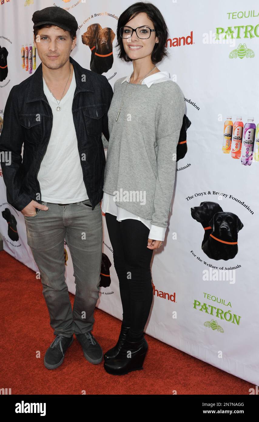 Peter Facinelli, left, and Jamie Alexander arrive at the "Saving Tails ...