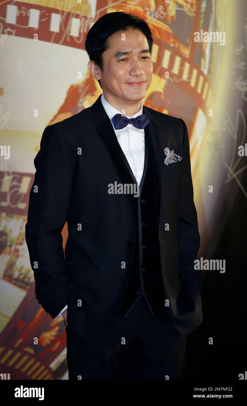 Hong Kong actor Tony Leung Chiu Wai poses on the red carpet of the 32nd ...