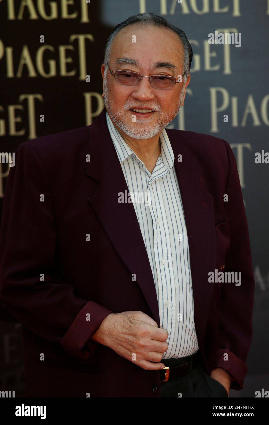 Hong Kong actor Lo Hoi Pang poses for photographers on the red carpet ...