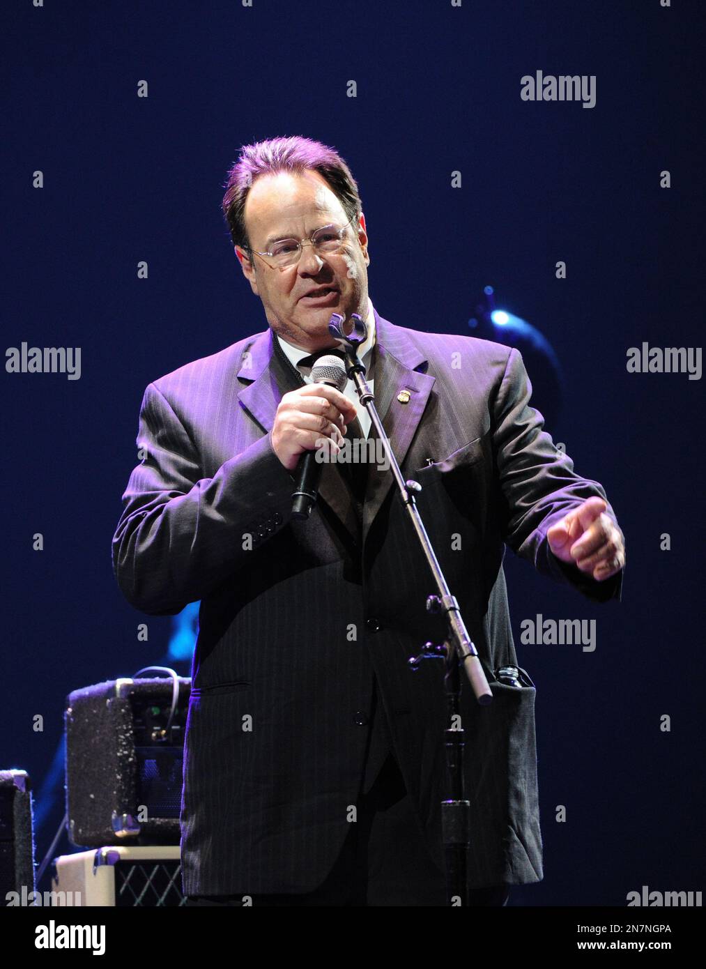 Actor and musician Dan Aykroyd serves as MC at Eric Clapton's ...