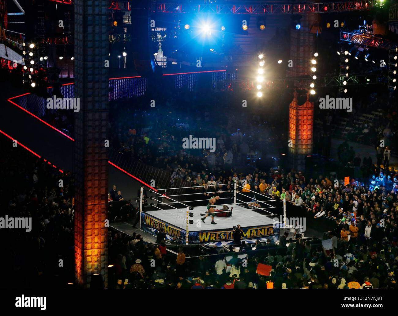 Wrestler Ryan Reeves, left, known as Ryback, stands over Mark Henry ...