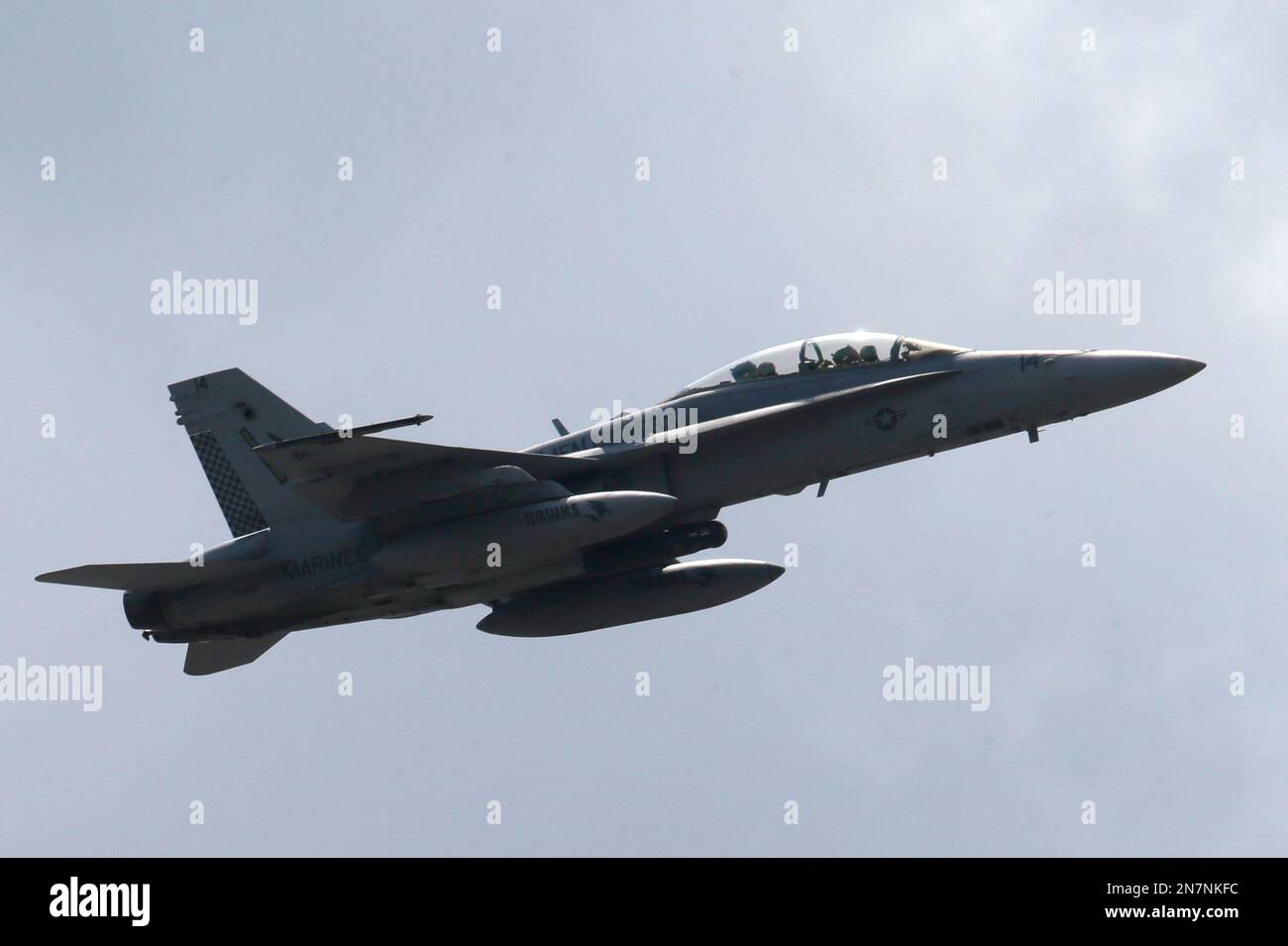 A US Marine F/A-18 Hornet fighter jet flies low pass during Philippines ...