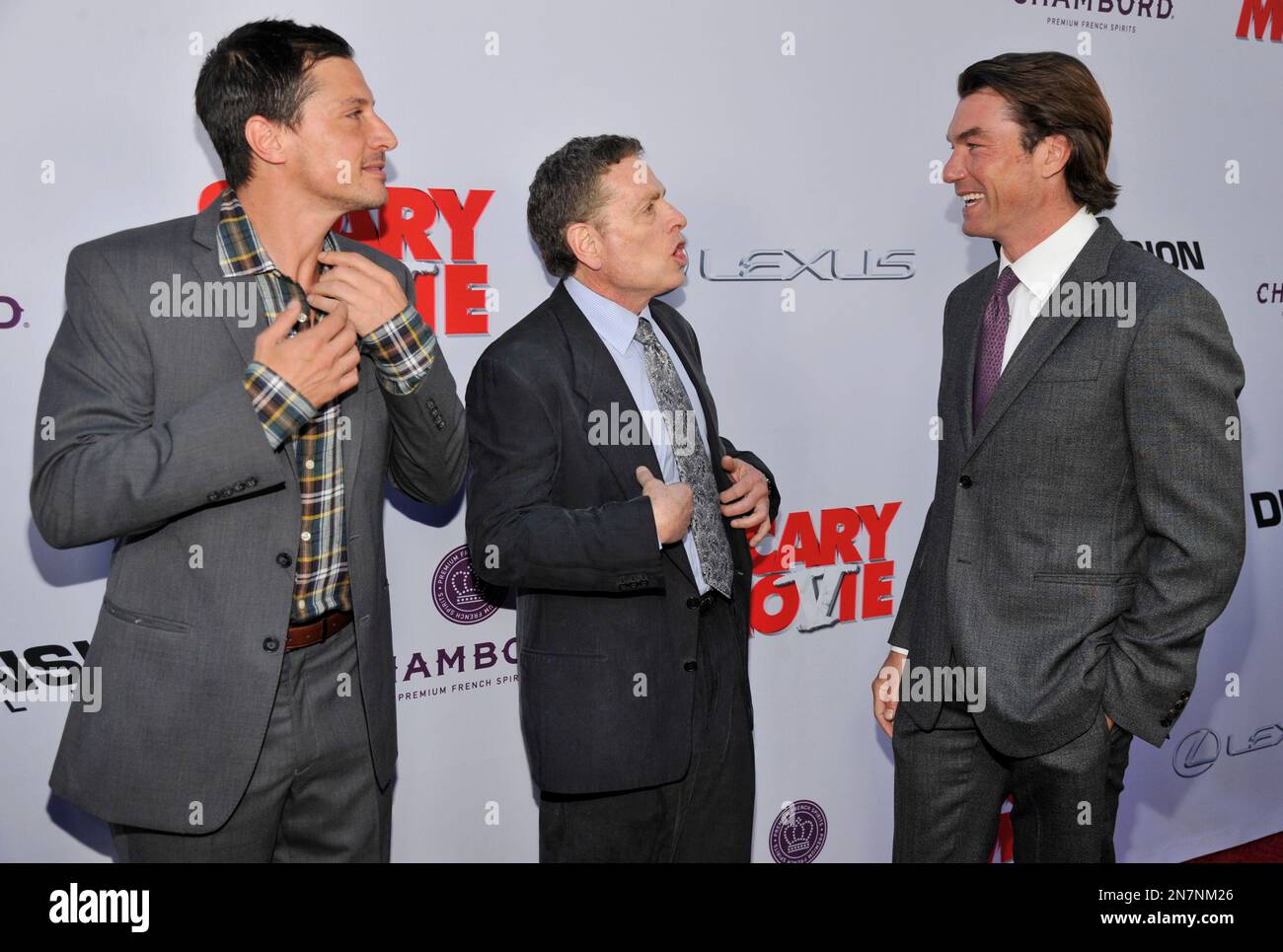 Producer David Zucker, center, mingles with cast members Simon Rex ...