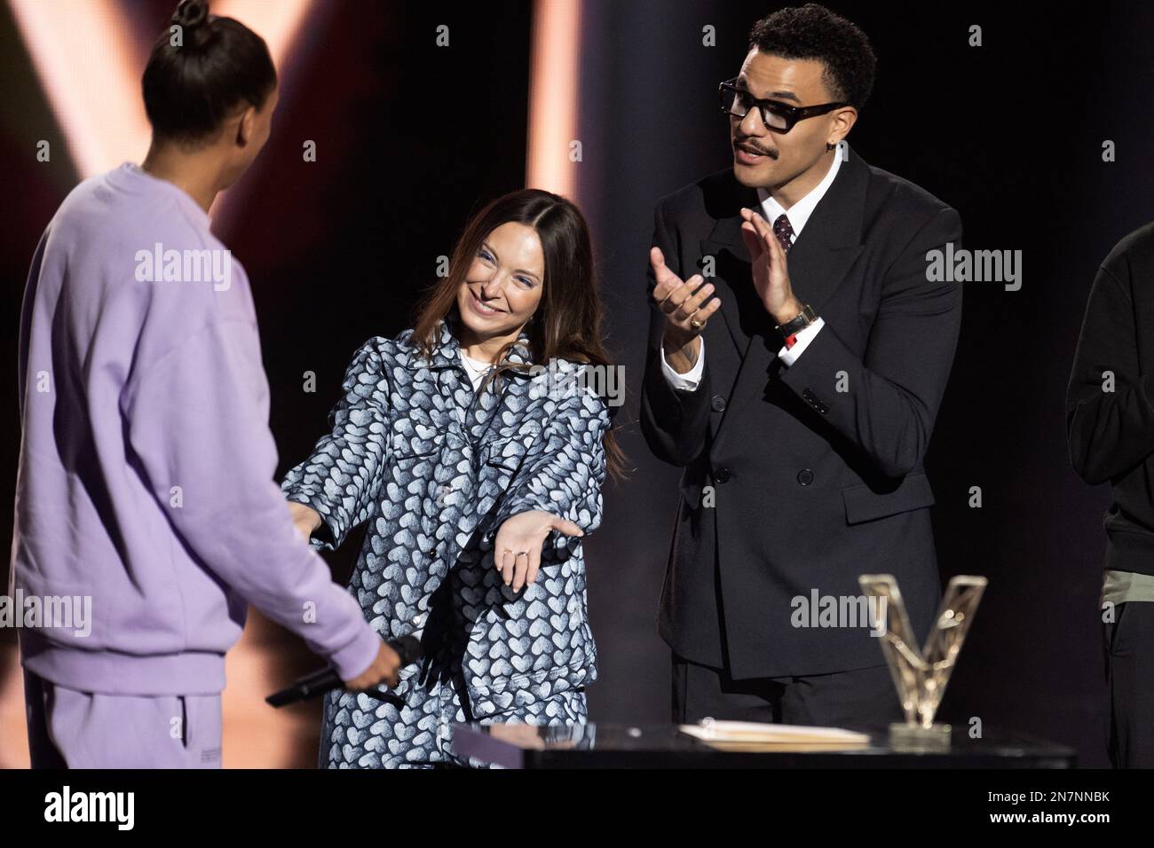 Stromae receives the Best Album award on stage with Coralie Barbier and ...